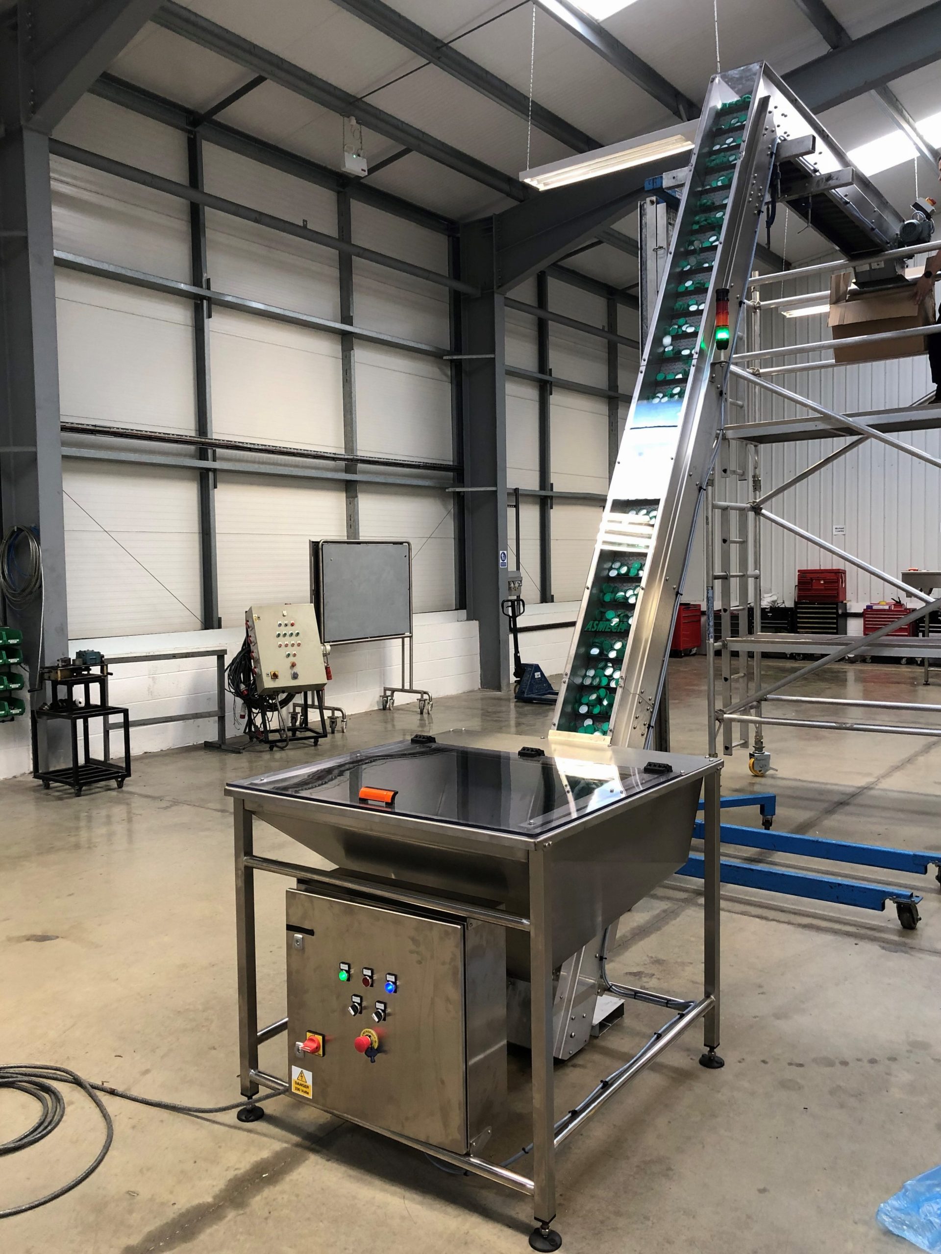 Cap Feed Elevator System - Asmech